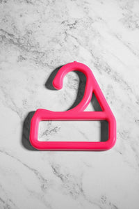 Neon Pink Hand-Aid Personal Holding Apparatus In Public Transport